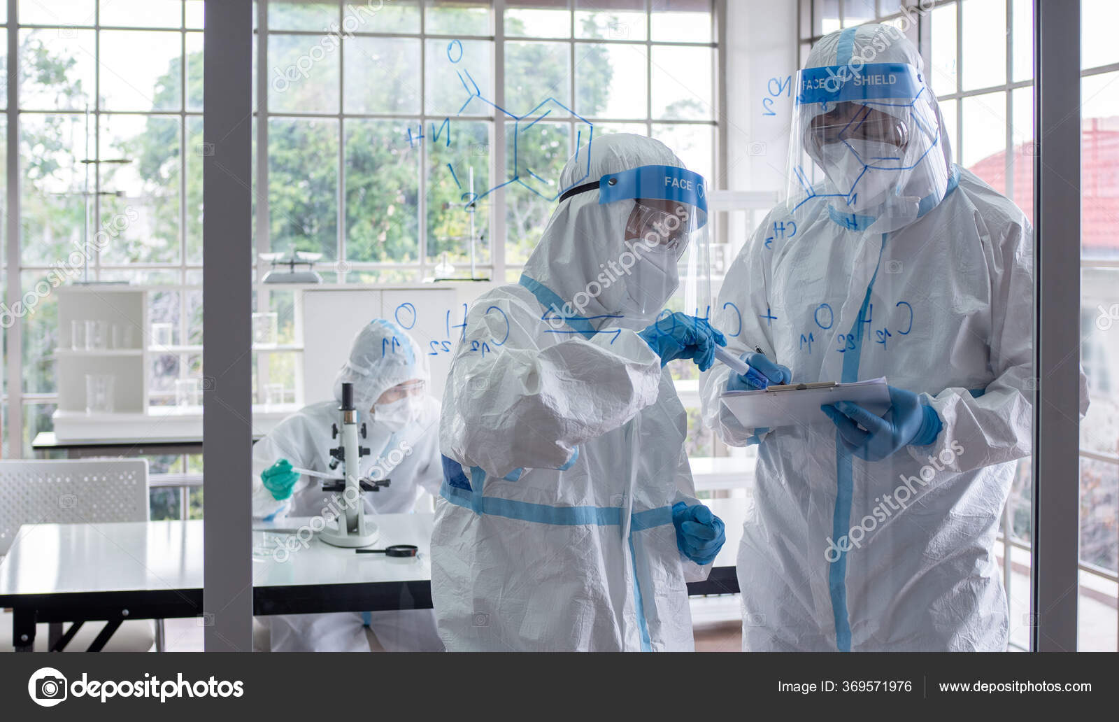 Scientists Microbiologists Ppe Suit Face Mask Lab Calculate Chemical ...