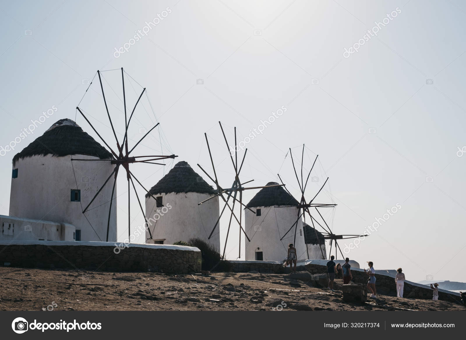 People in front of traditional Greek windmills in Hora (Mykonos — Stock ...
