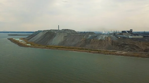 Aerial view of big grain elevators on the sea. Loading of grain on a ...