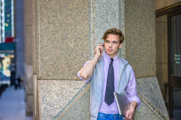 College Student calling on cell phone on street - Stock Image - Everypixel