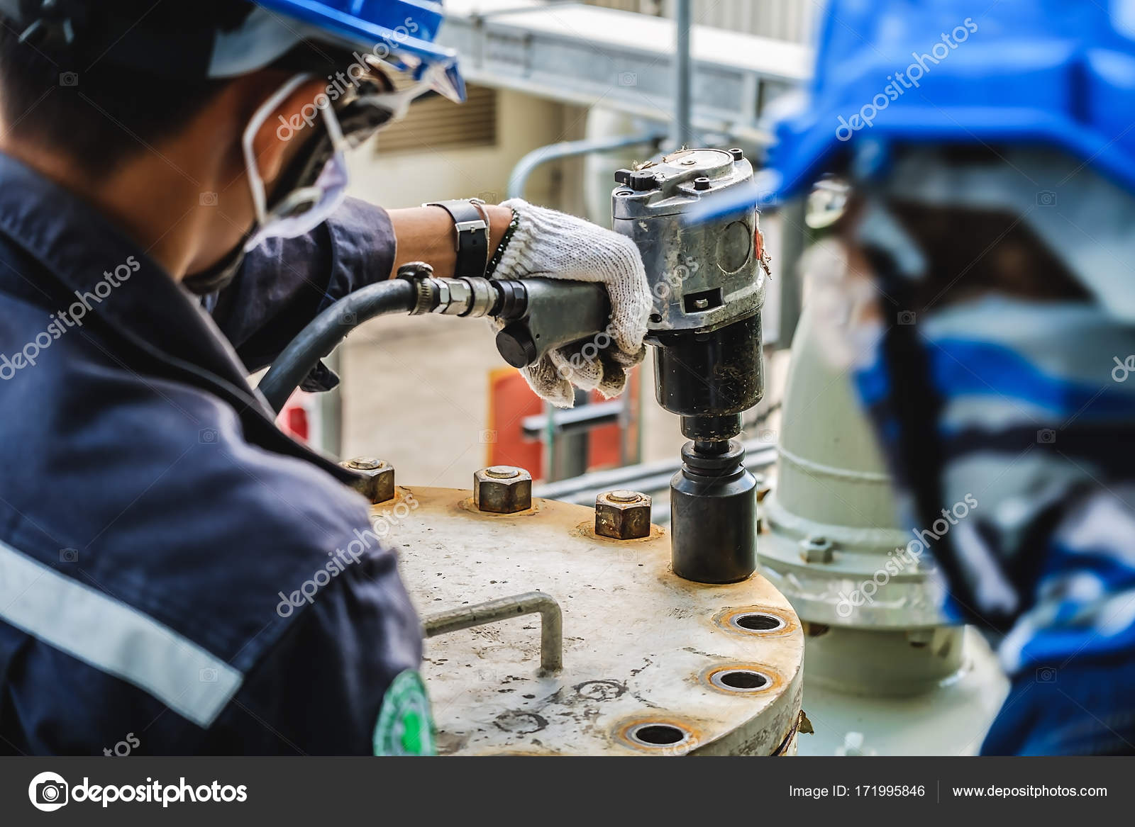 Workers Hand Holding Machine Tightening Nut Mechanic Repairing Machine ...