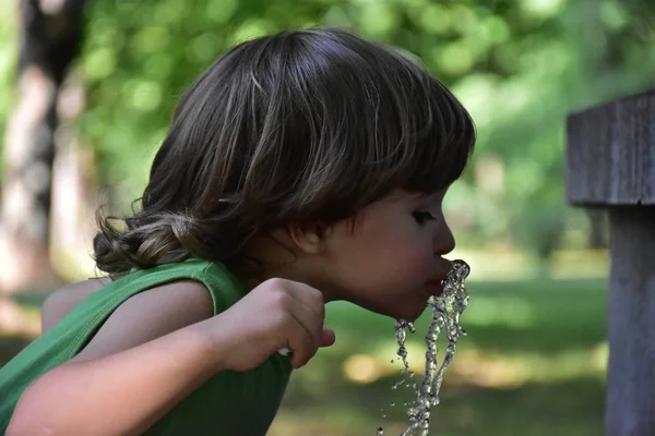 Child spitting water Stock Photos, Royalty Free Child spitting water ...