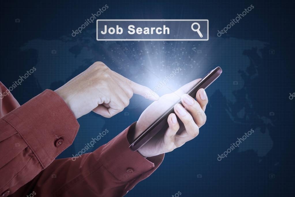 Hand with cellphone and job search bar — Stock Photo © realinemedia ...