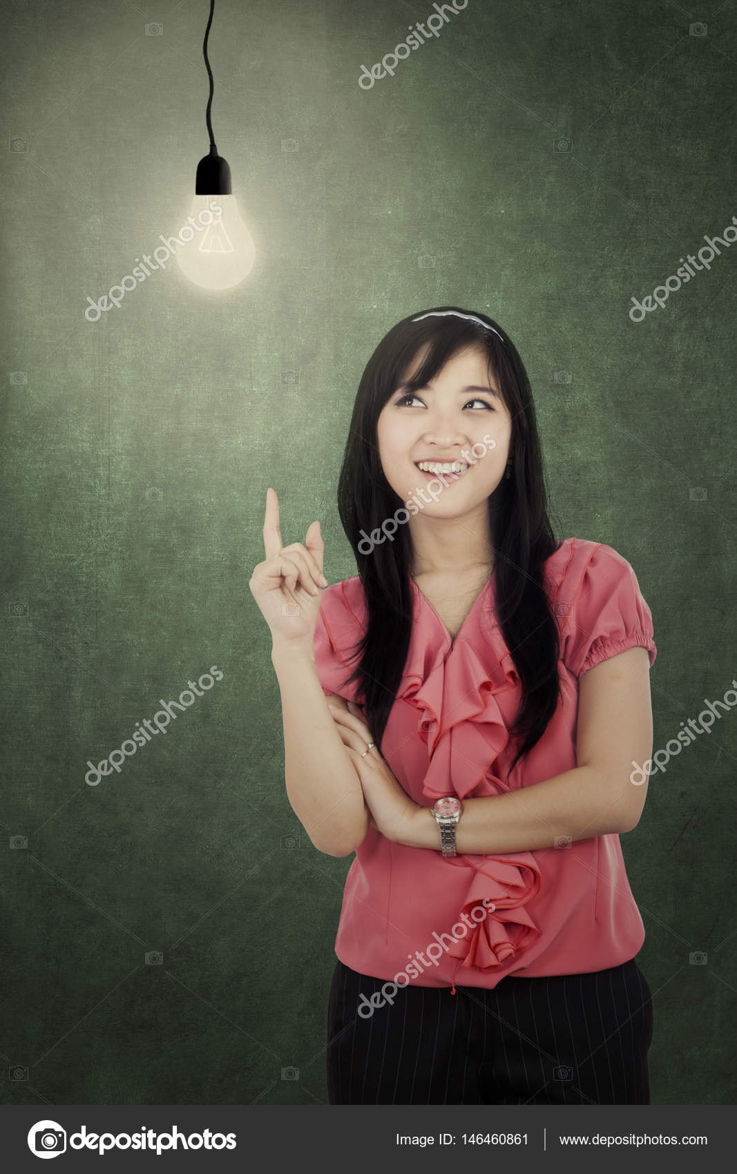 Woman has an idea with light bulb — Stock Photo © realinemedia #146460861