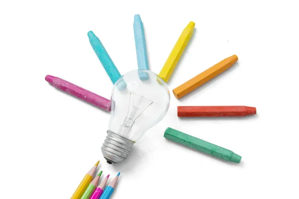 Light bulb and colored pencils — Stock Photo © goccedicolore #42154101