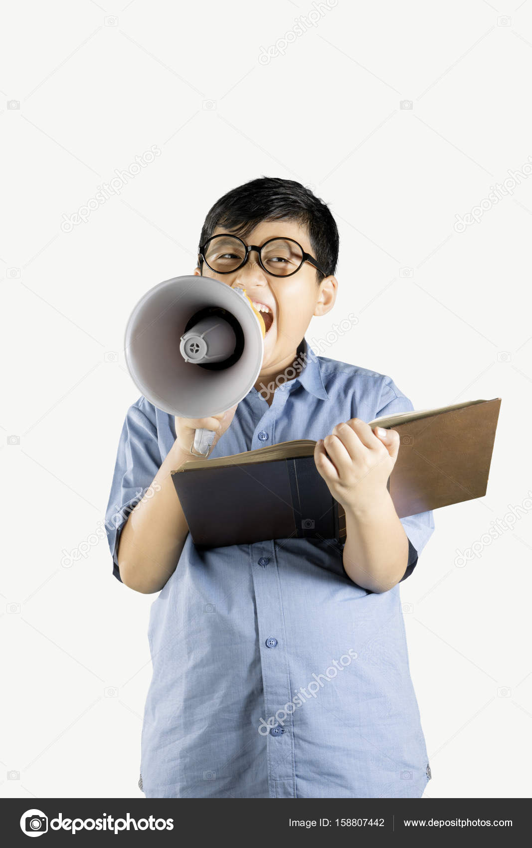 Boy student using a megaphone Stock Photo by ©realinemedia 158807442