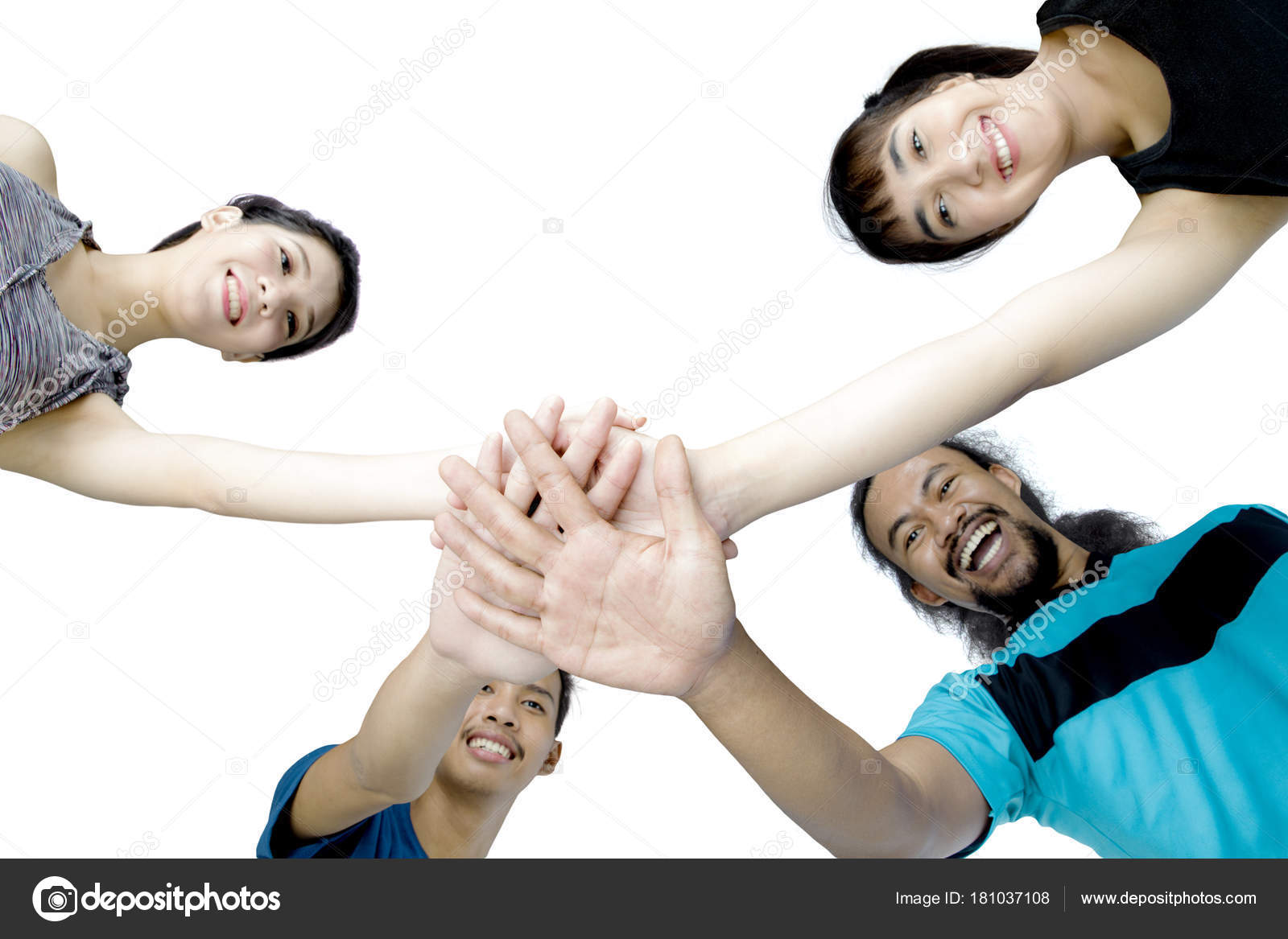 Four people joining their hands on studio Stock Photo by ©realinemedia ...