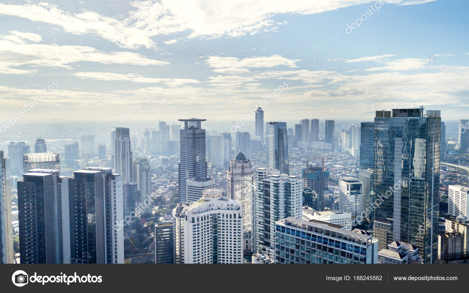 Jakarta skyline with modern office buildings and apartments at sunny ...