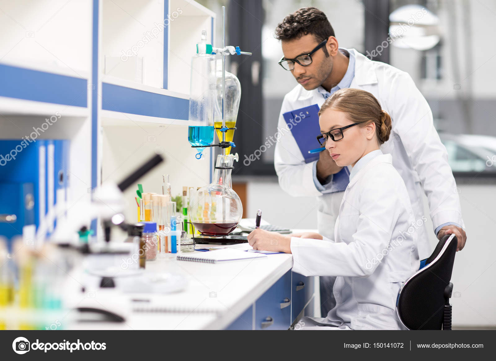 Scientists working in laboratory — Stock Photo © AlexFedorenko #150141072 Scientists working in laboratory — Stock Photo © AlexFedorenko #150141072