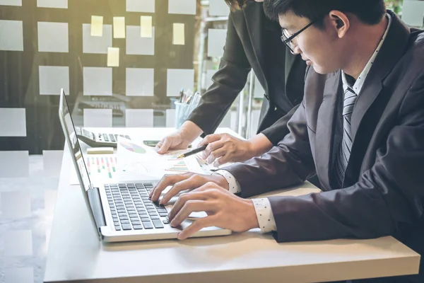 Business team working with computer, document graph in team Meet ...