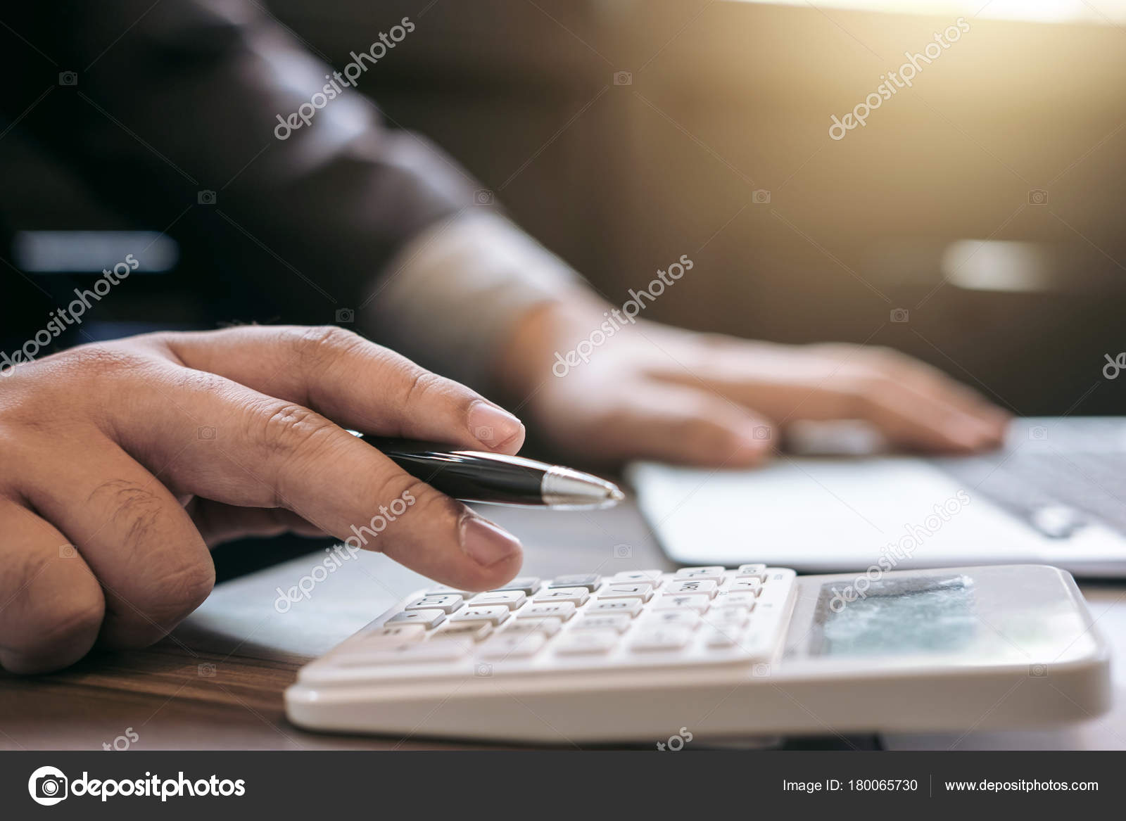 Professional businessman working with calculator, Doing finance Stock ...