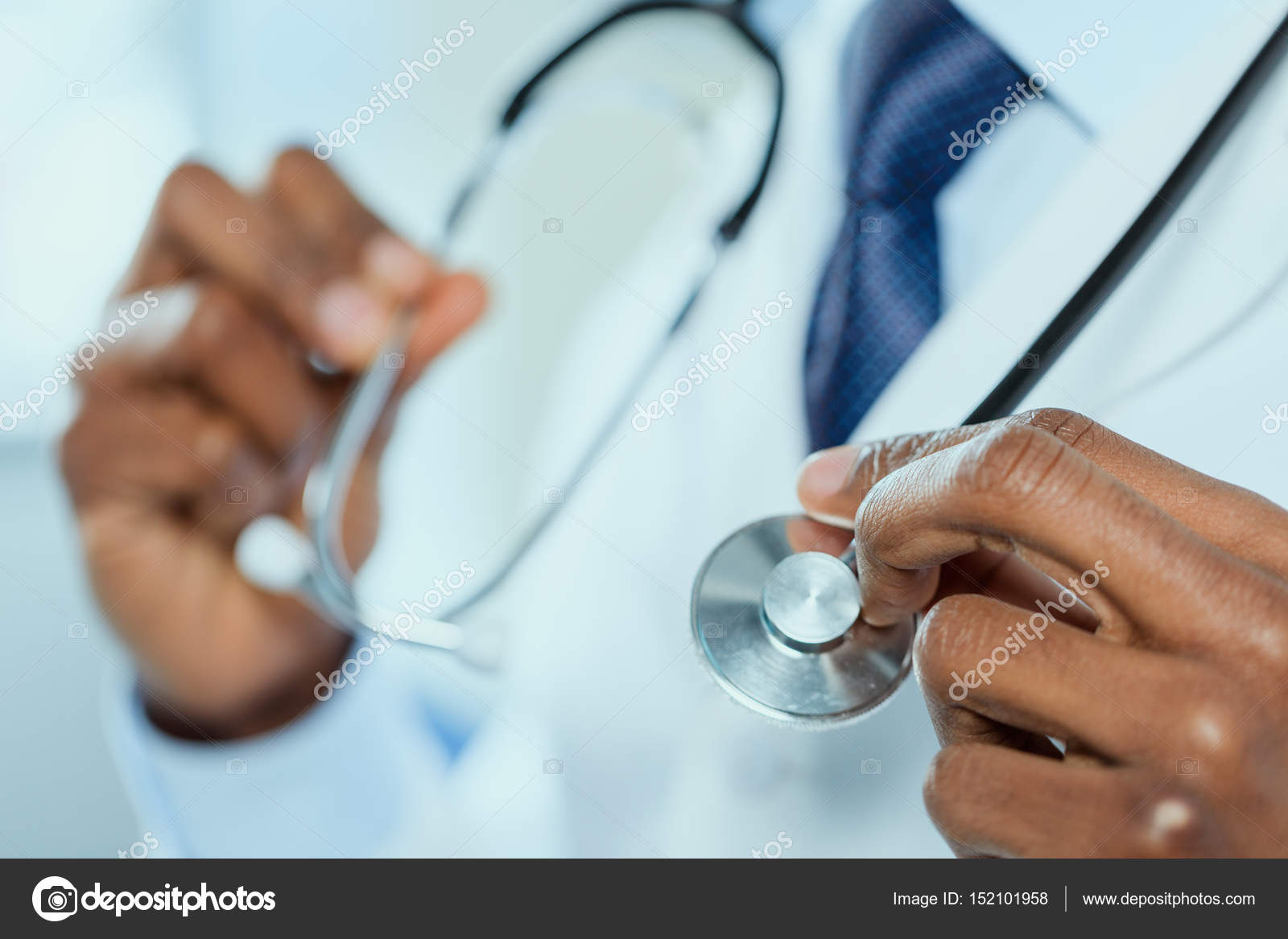 Doctor holding stethoscope in hands — Stock Photo © AlexNazaruk #152101958