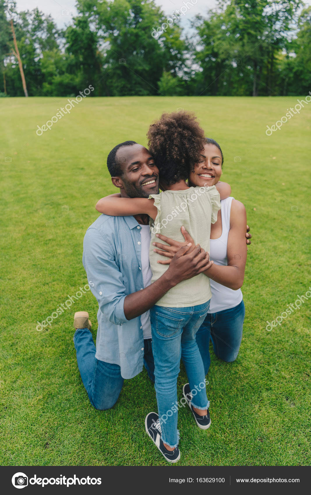 Family Hugging Each Other