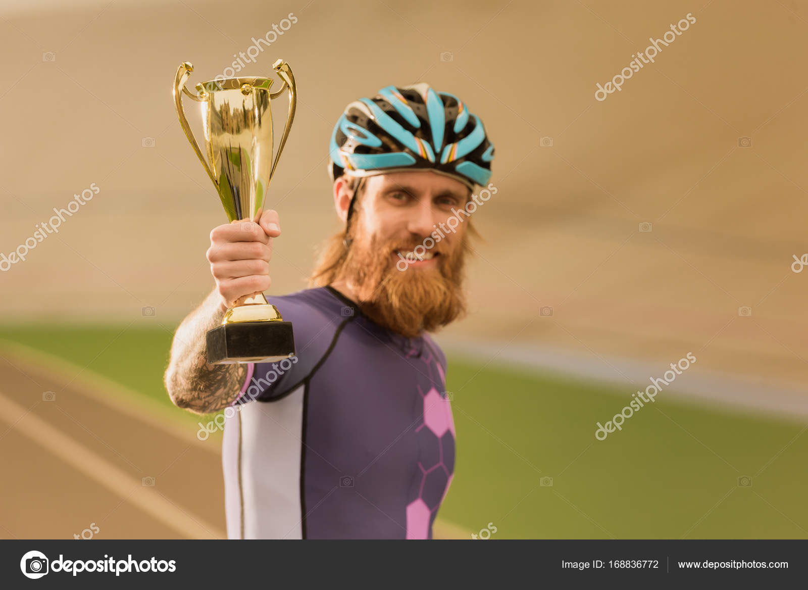 Cyclist with champion cup — Stock Photo © AlexNazaruk #168836772