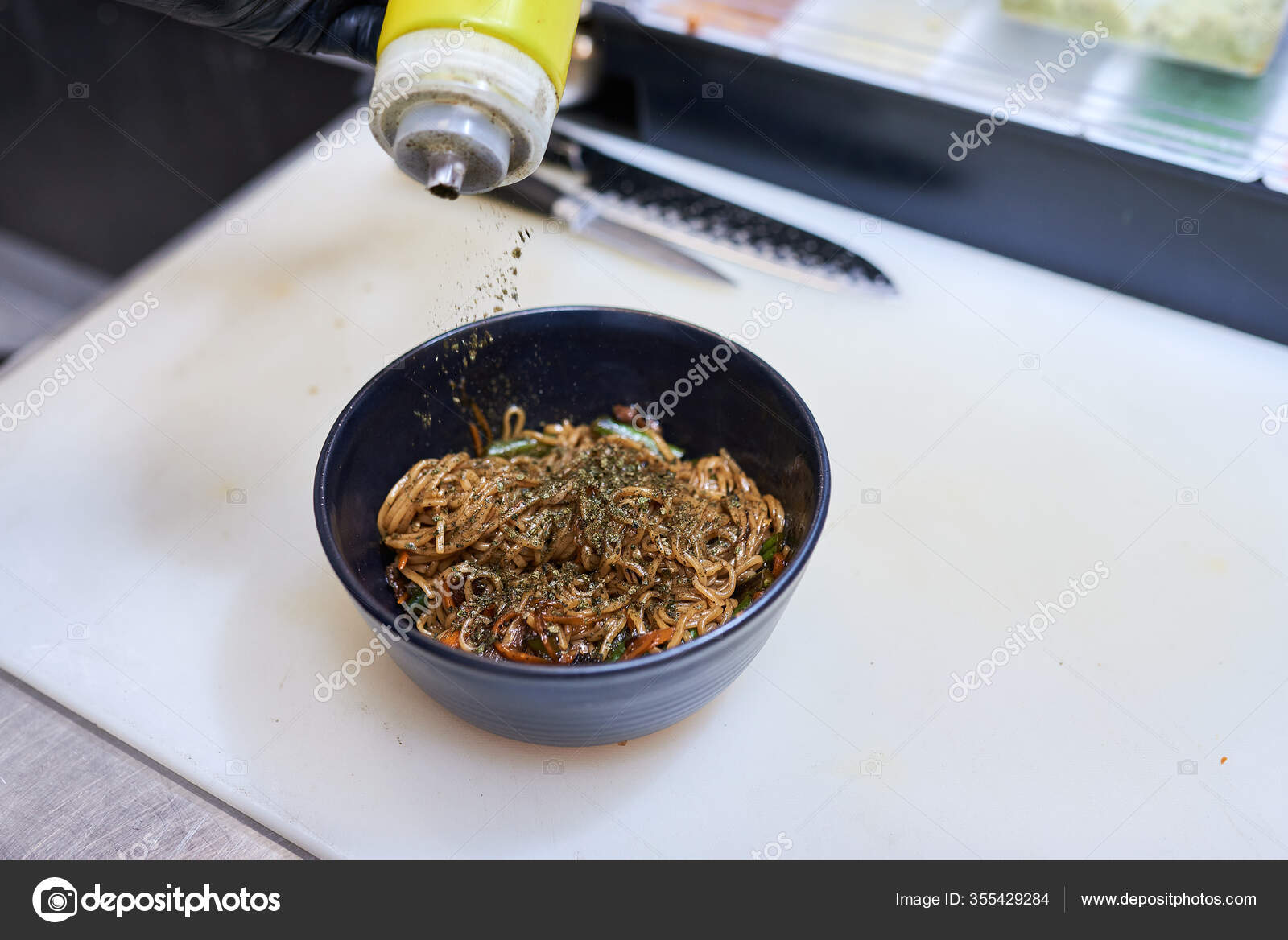 Cooking process fried noodles with vegetables in the wok, traditional ...