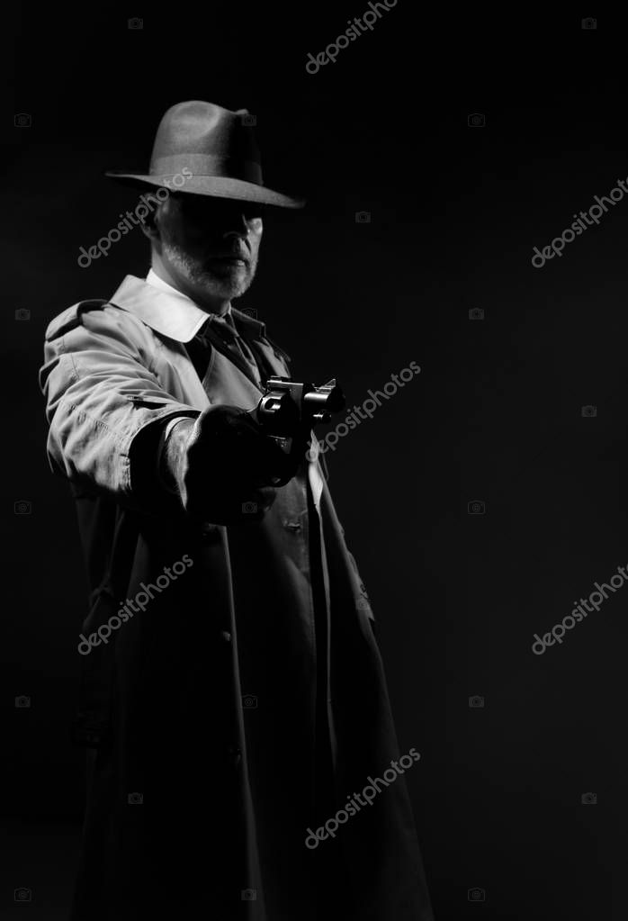 Spy agent pointing gun in dark — Stock Photo © stokkete #146418939