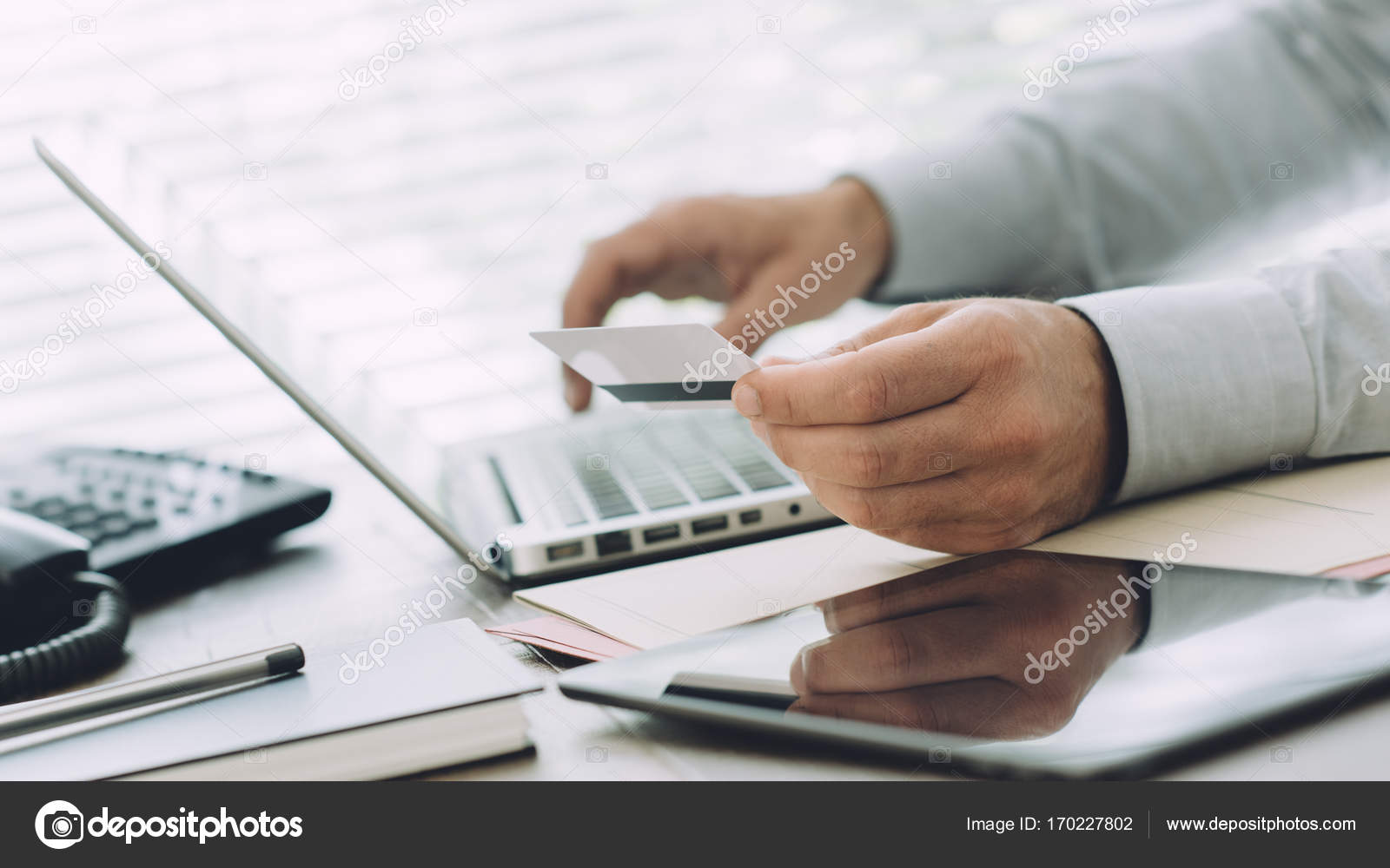 Businessman doing online banking — Stock Photo © stokkete #170227802