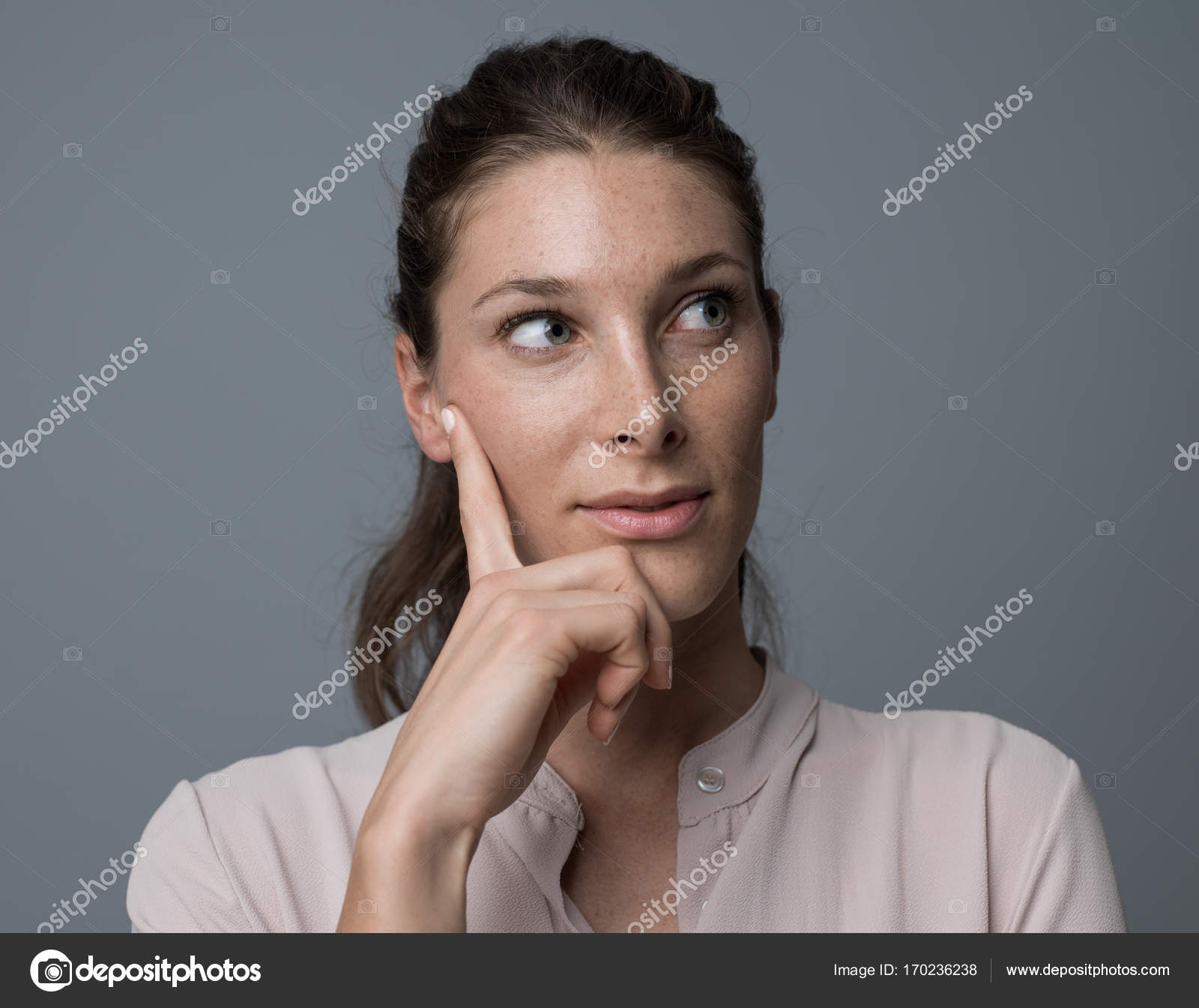 Confident woman thinking Stock Photo by ©stokkete 170236238
