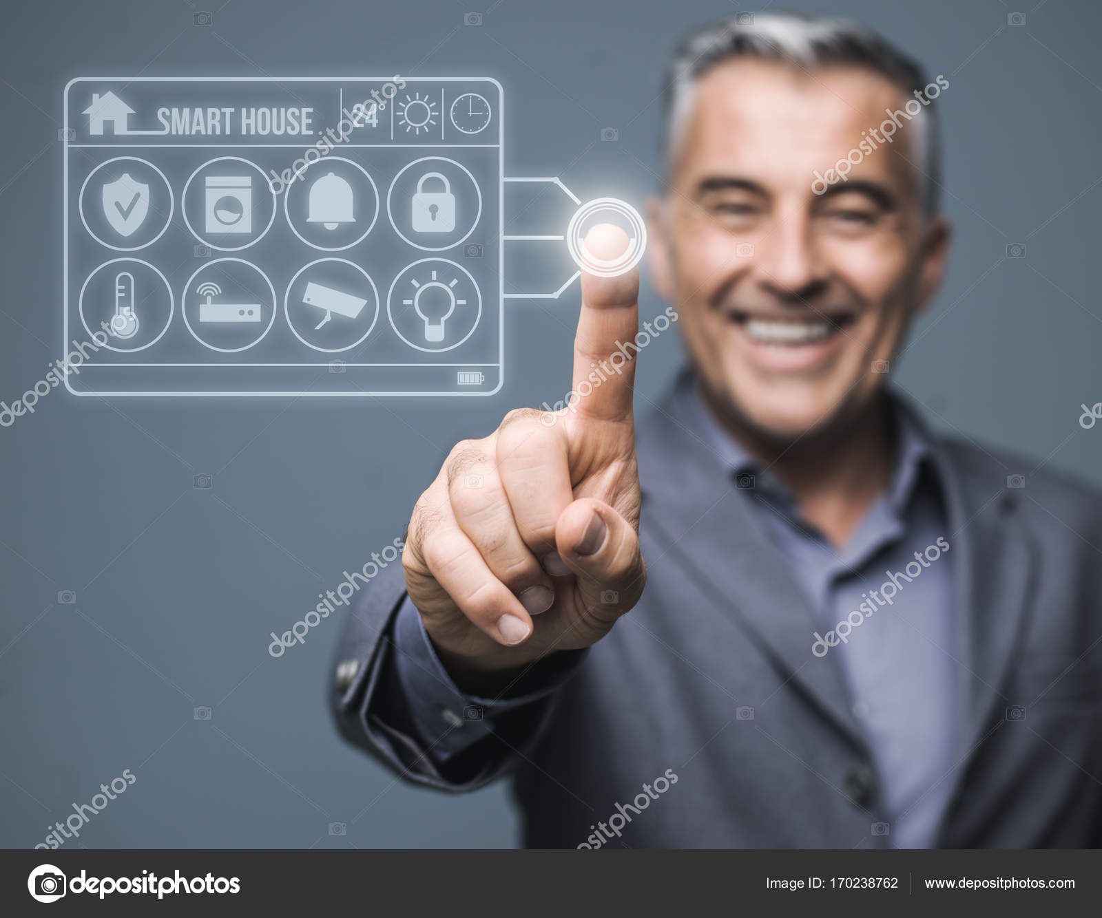Confident man monitoring smart house Stock Photo by ©stokkete 170238762 Confident man monitoring smart house Stock Photo by ©stokkete 170238762