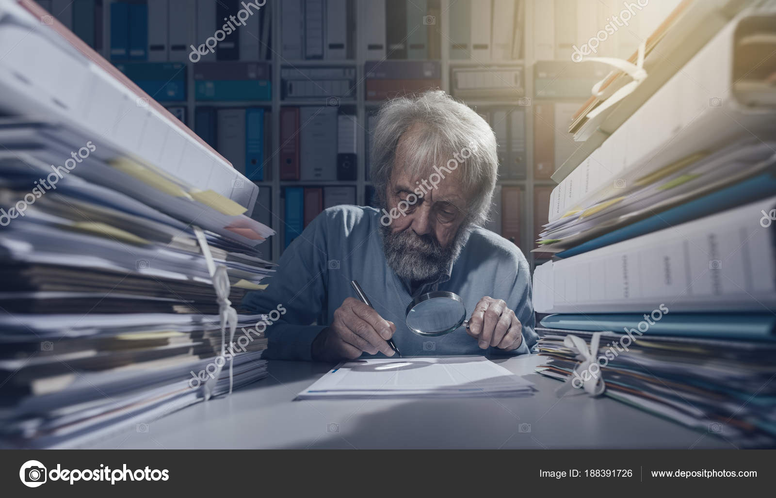 Senior researcher using a magnifier — Stock Photo © stokkete #188391726