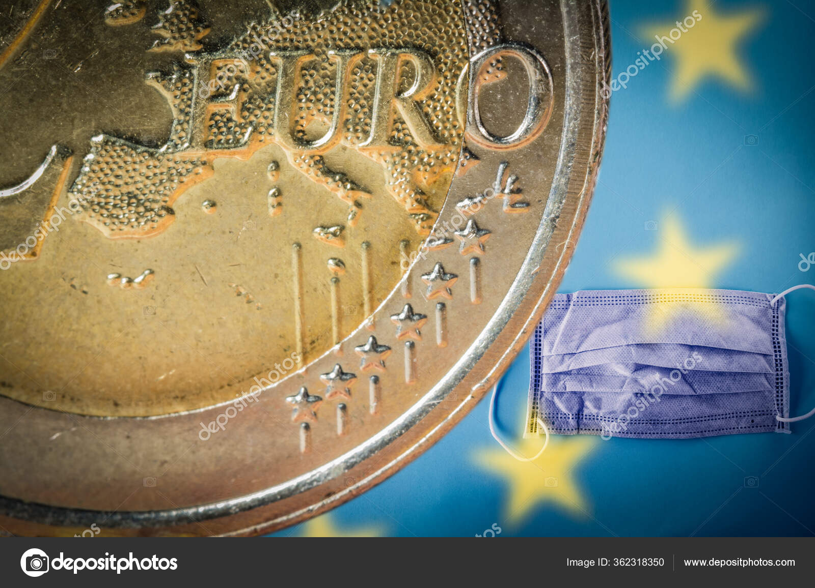 2 Euro coin with a face surgical mask. Stock Photo by ©tbtb 362318350