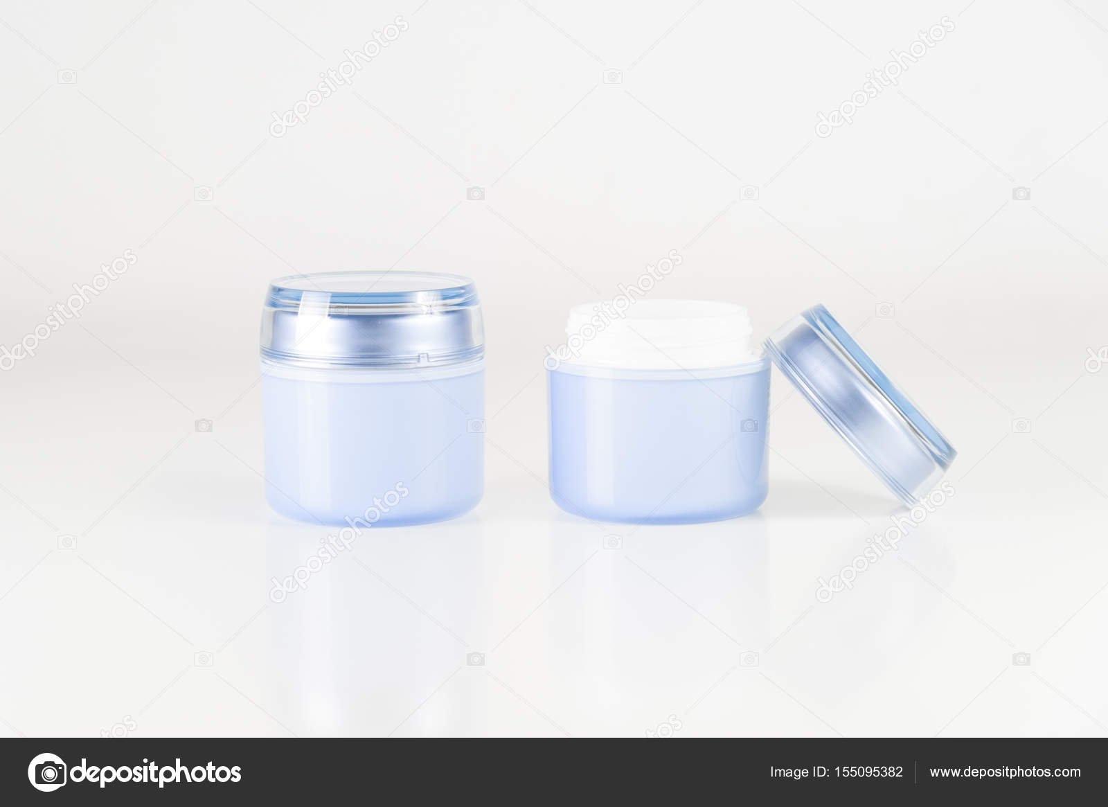 Blue cosmetic containers Stock Photo by ©Khamlaksana 155095382
