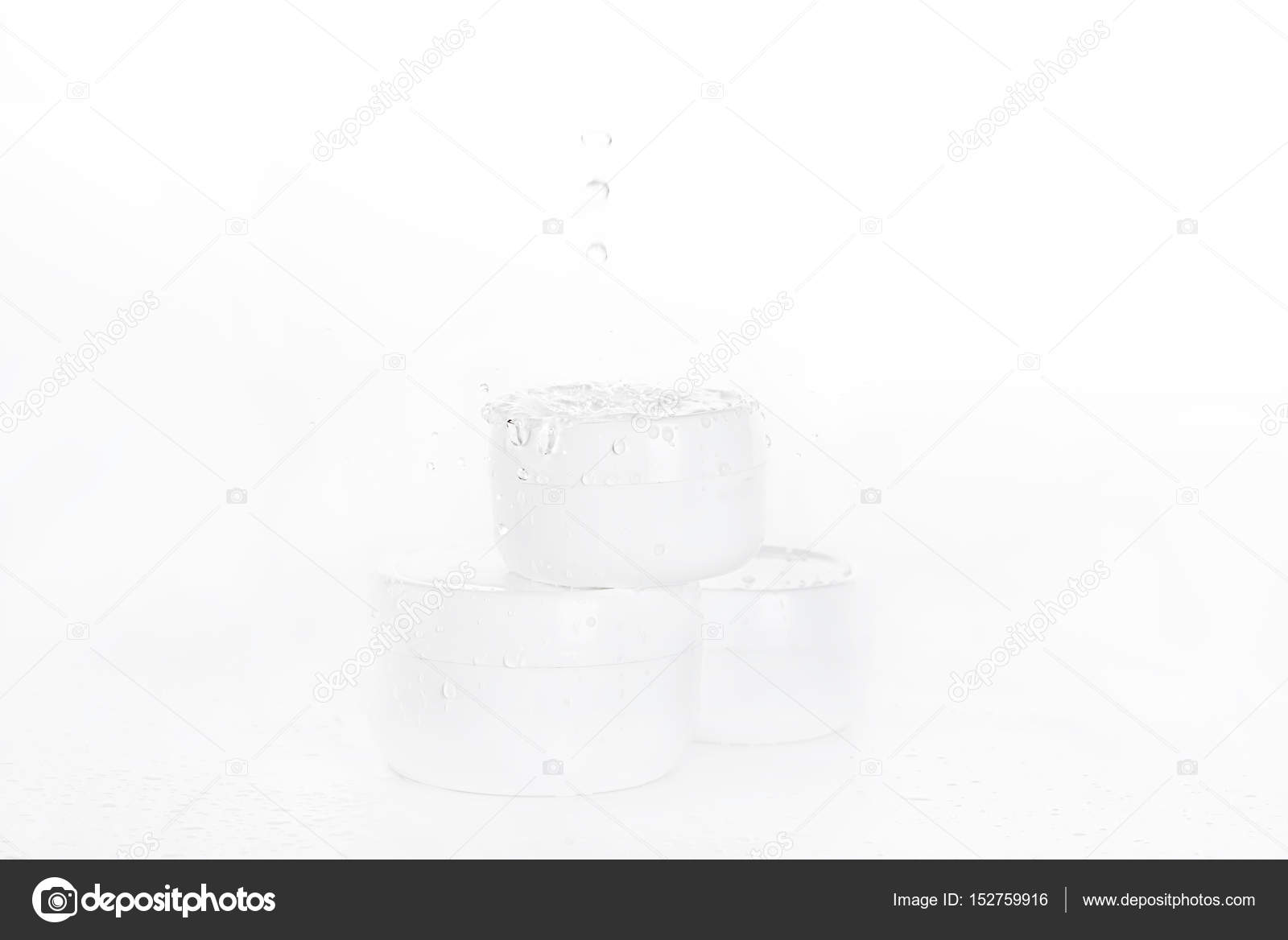 Water drops falling on boxes — Stock Photo © alebloshka #152759916