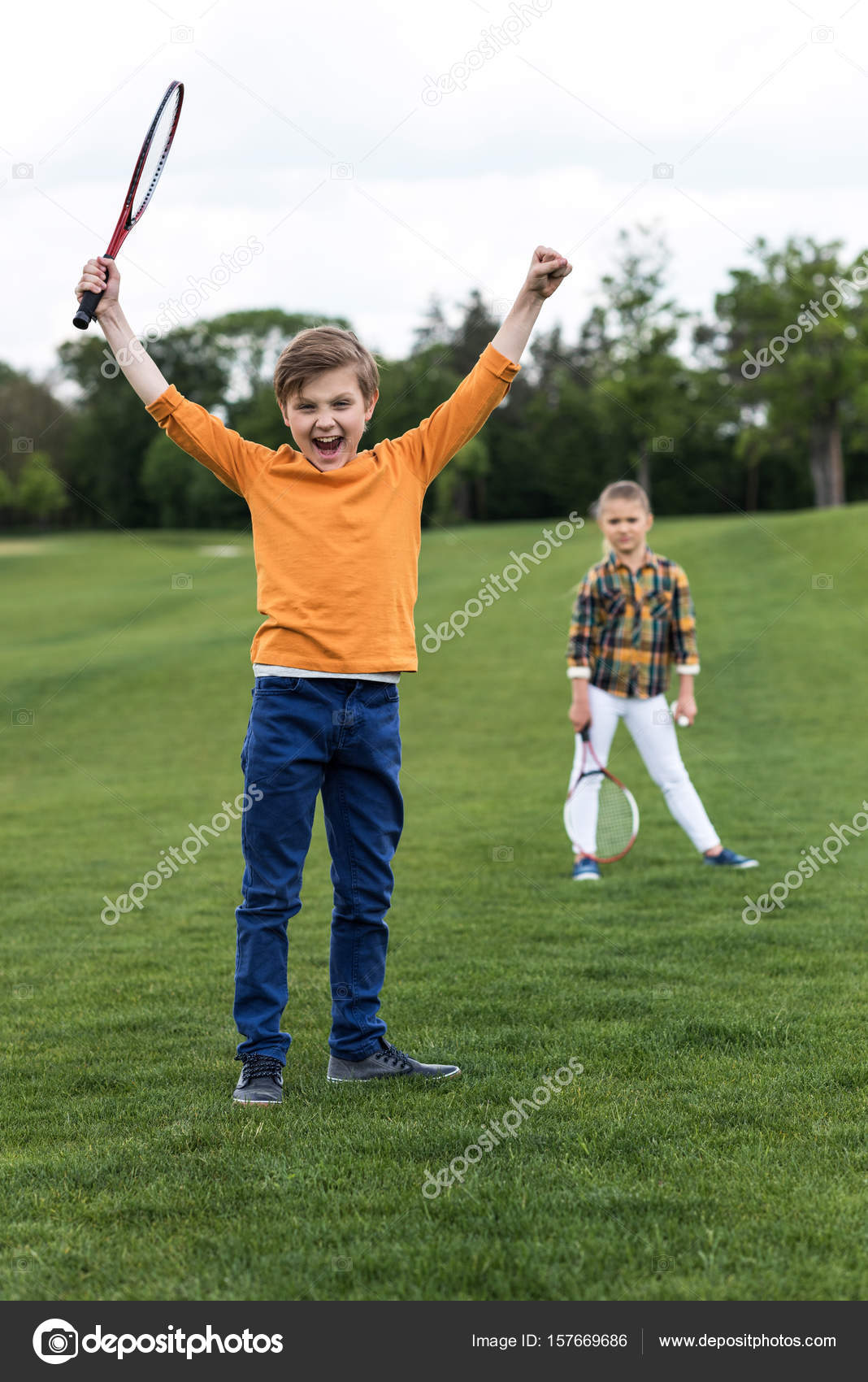 Kids with badminton racquets — Free Stock Photo © alebloshka #157669686