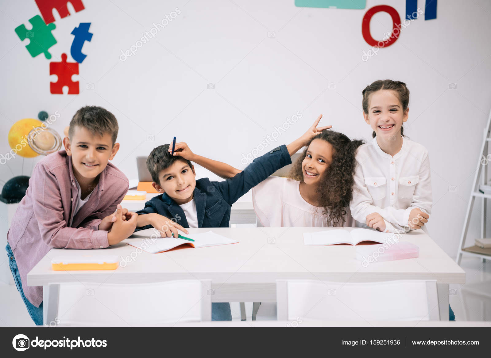 Multiethnic pupils at school — Stock Photo © alebloshka #159251936