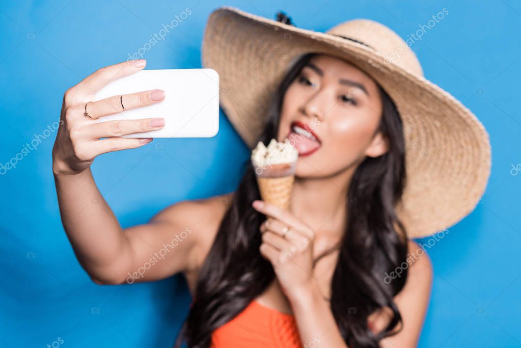 Woman taking selfie with ice-cream — Stock Photo © alebloshka #166446320