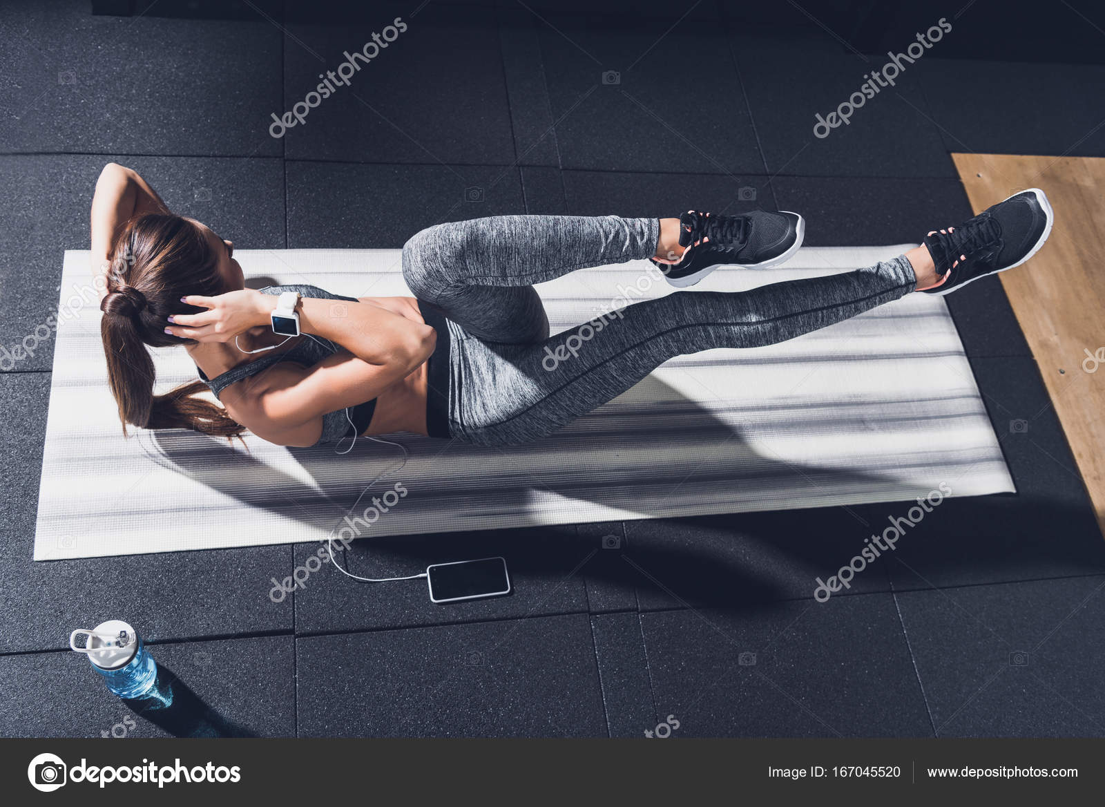 Woman doing abs exercises — Stock Photo © alebloshka #167045520