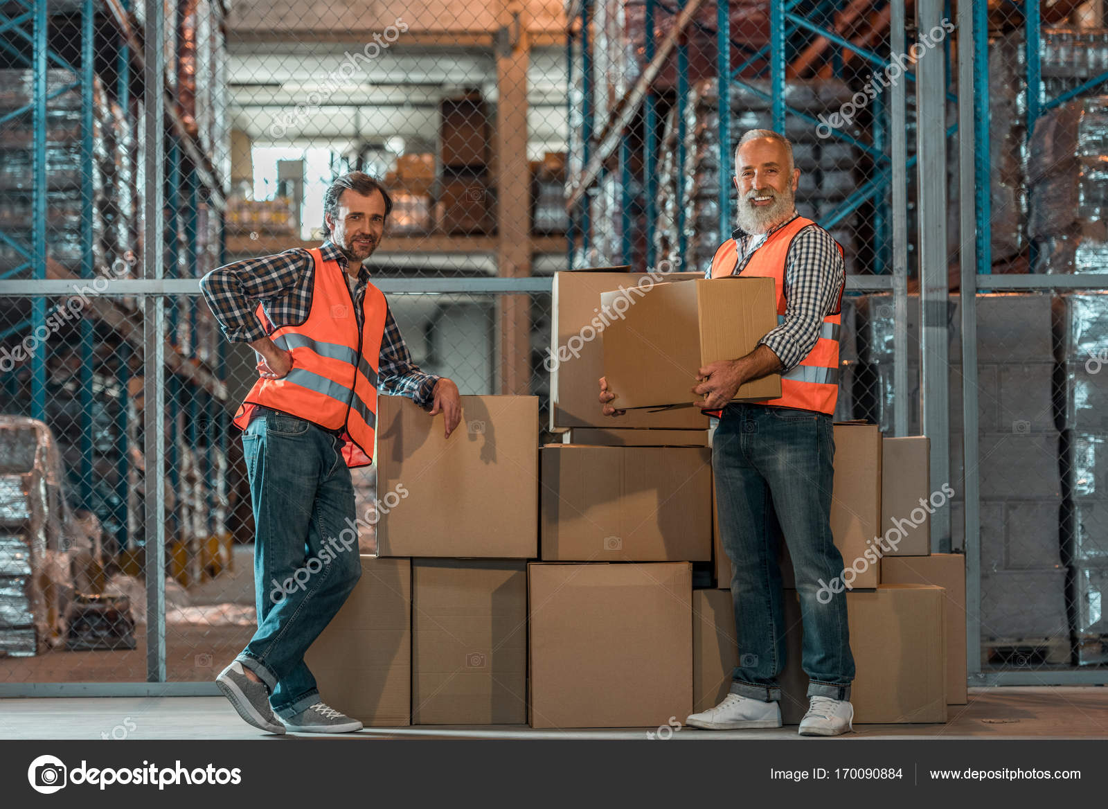 Warehouse workers with boxes — Stock Photo © alebloshka #170090884
