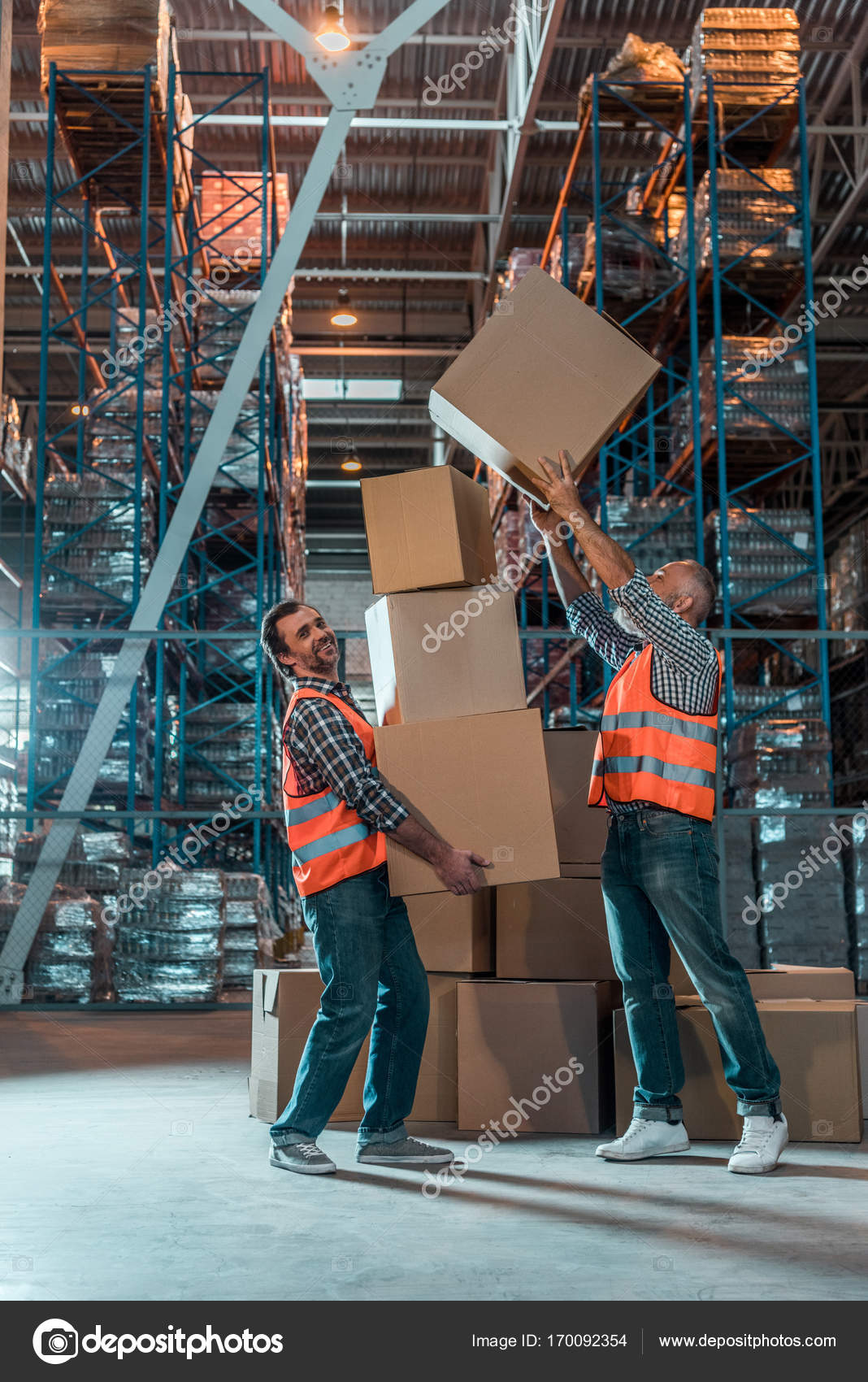 Warehouse workers with boxes — Stock Photo © alebloshka #170092354