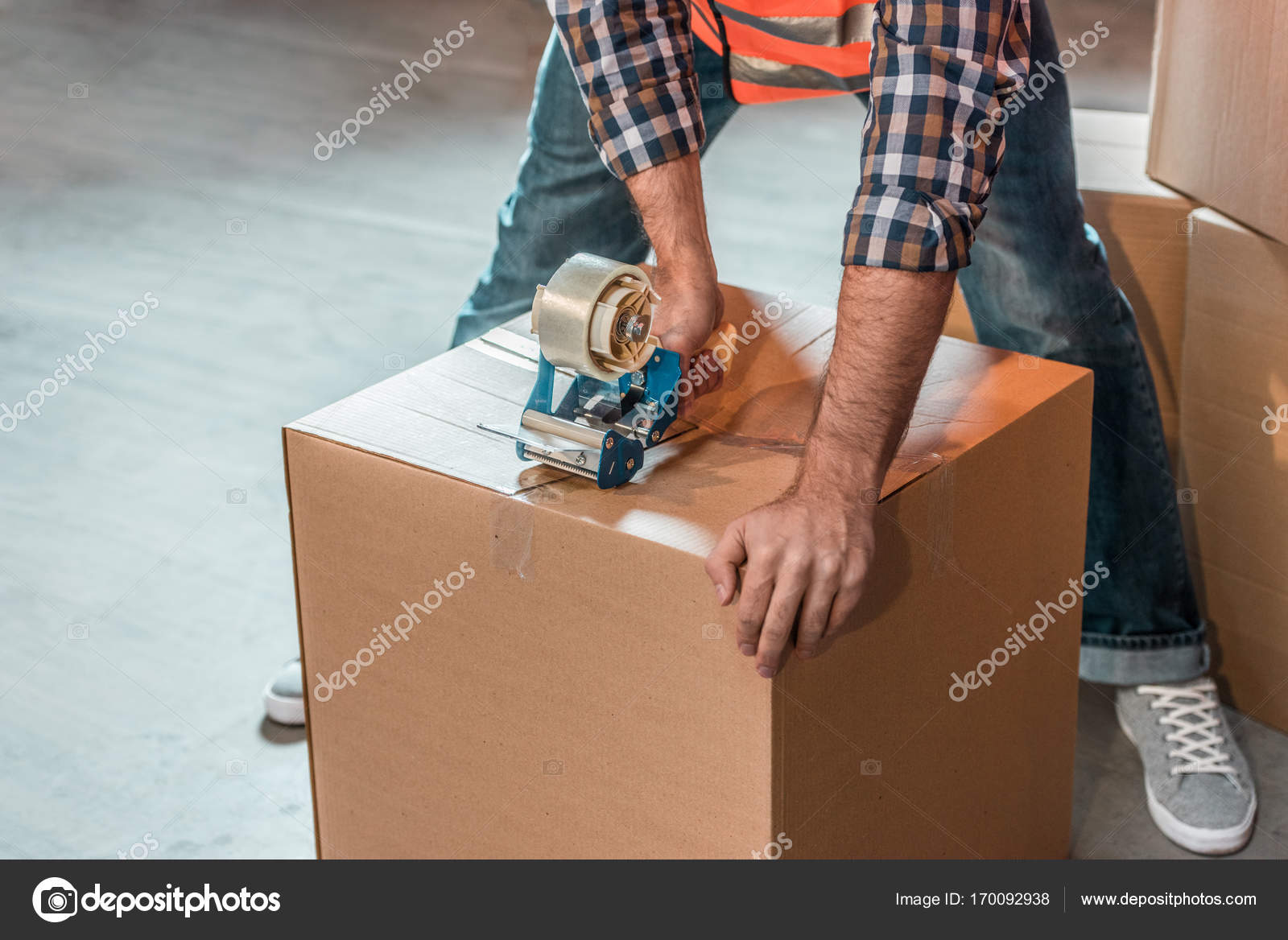 Warehouse worker packing box — Stock Photo © alebloshka #170092938