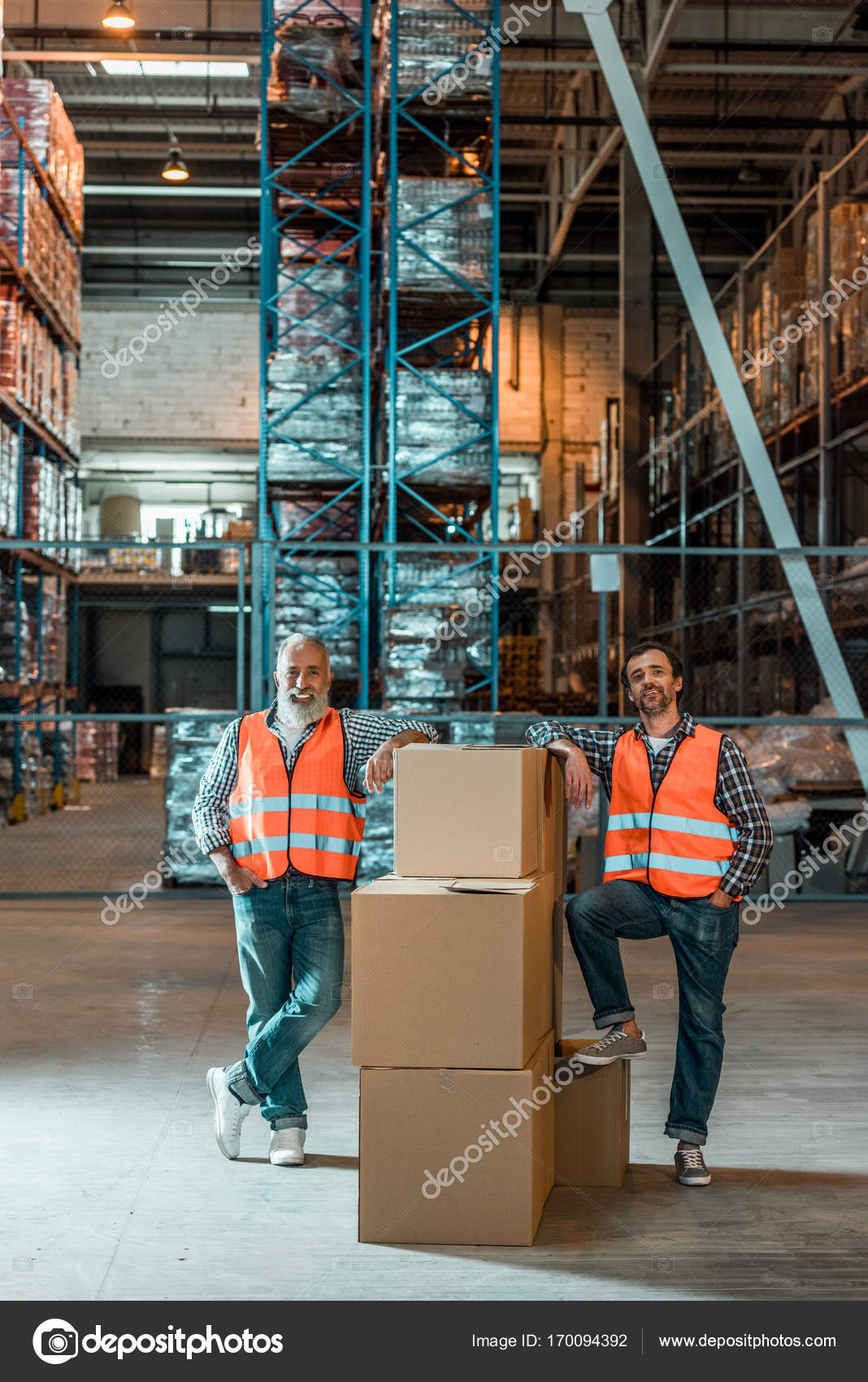 Warehouse workers with boxes — Stock Photo © alebloshka #170094392