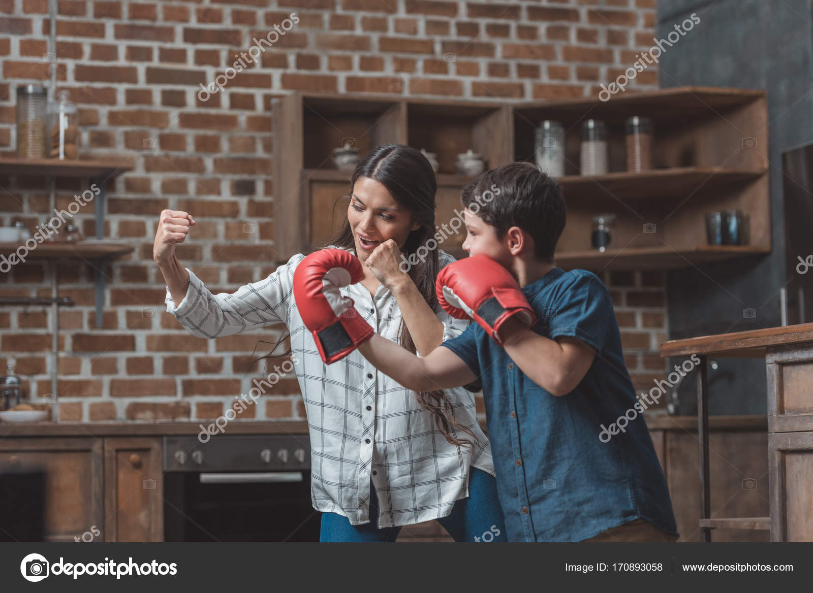 Mother and son practice boxing — Stock Photo © alebloshka #170893058