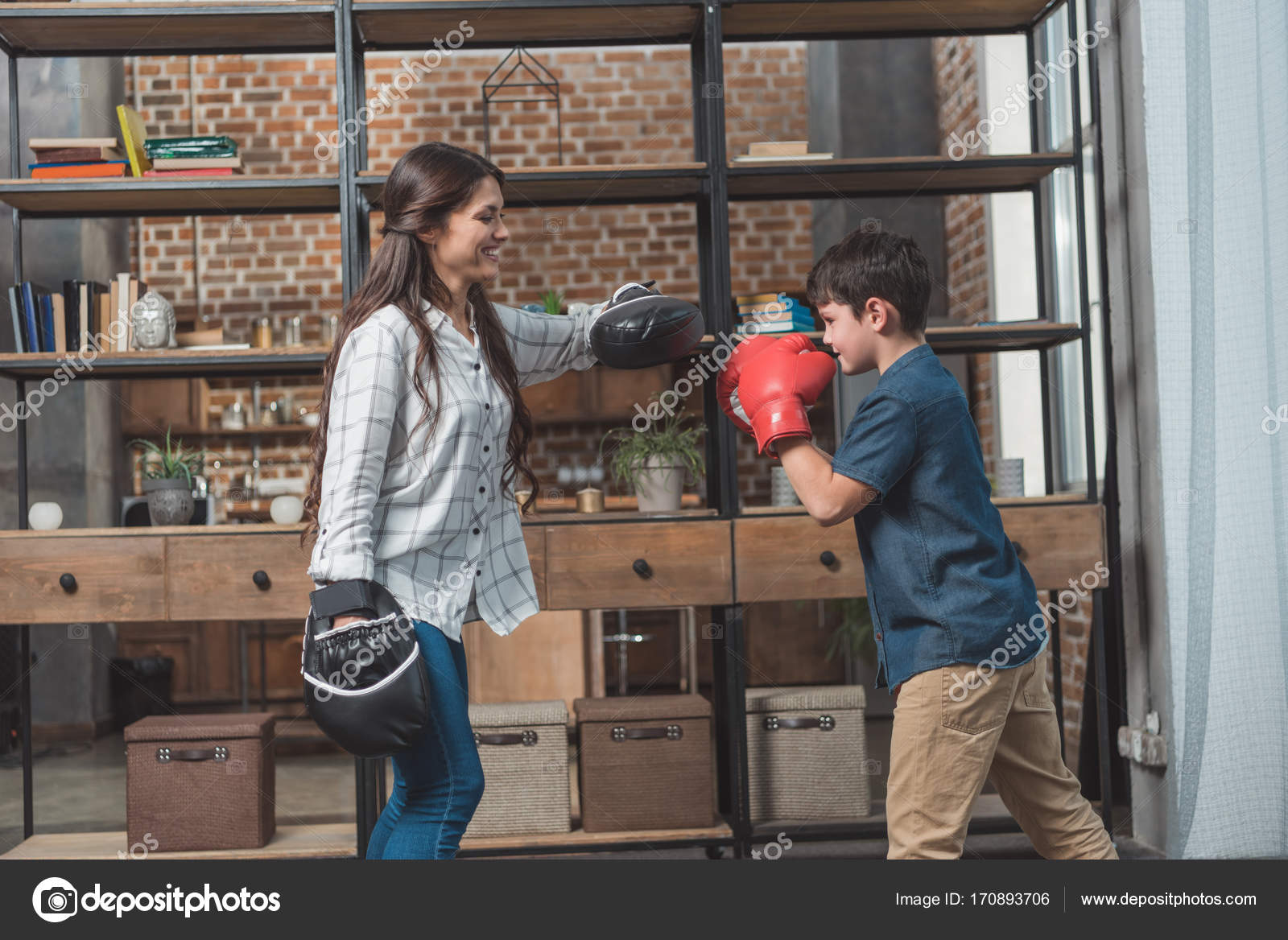 Mother and son practice boxing — Stock Photo © alebloshka #170893706