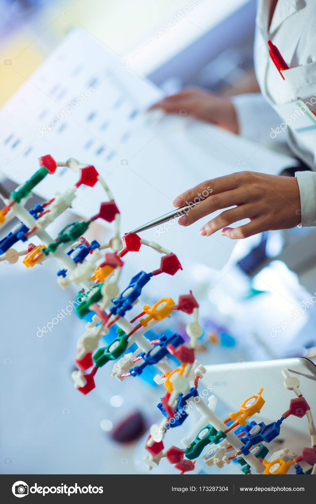 Scientist looking at DNA in laboratory — Stock Photo © adriaticphoto ...