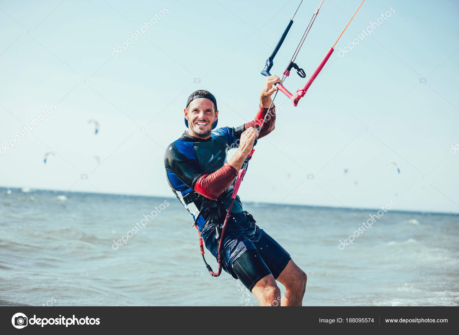 View Man Riding Kiteboard Wavy Sea Stock Photo by ©adriaticphoto 188095574