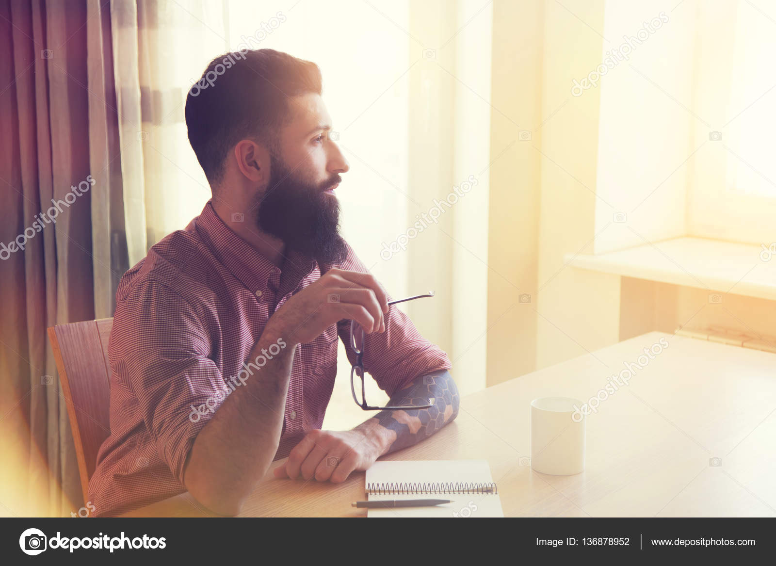 Bearded man with glasses writing with pen — Stock Photo © dedivan1923 ...