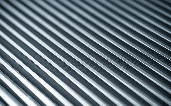 Corrugated gold metal texture — Free Stock Photo © xamtiw #117496906