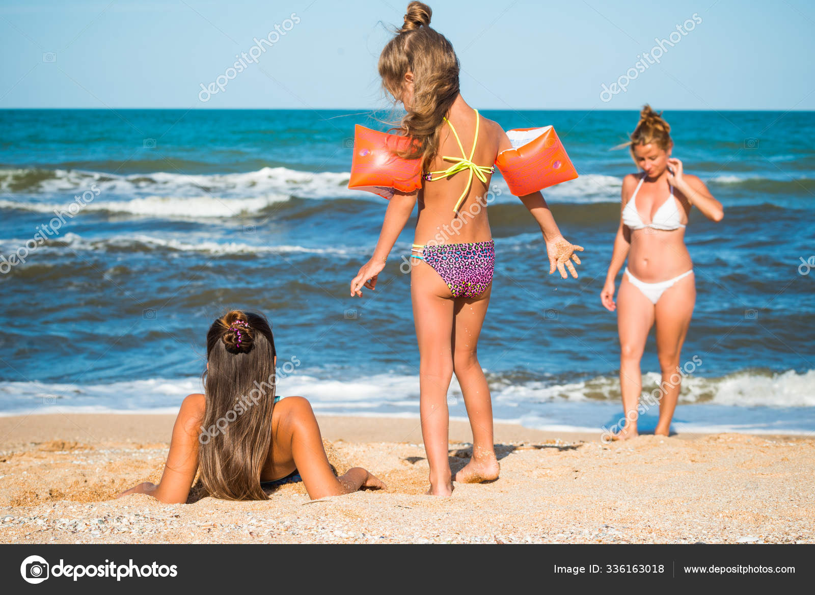 Slim beautiful young woman and little daughters Stock Photo by ... Slim beautiful young woman and little daughters Stock Photo by ...