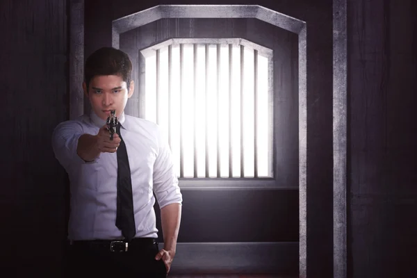 Secret Agent Holding Gun - Stock Image - Everypixel