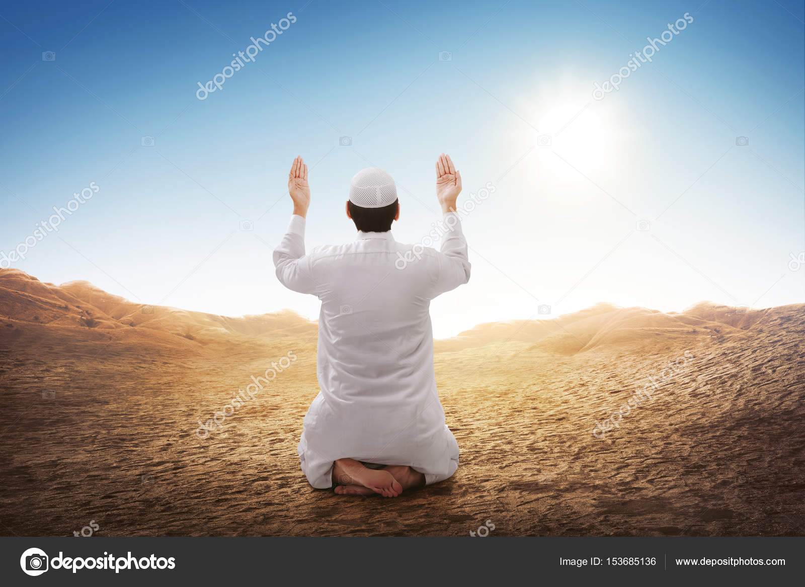 Asian muslim man sitting and praying Stock Photo by ©leolintang 153685136