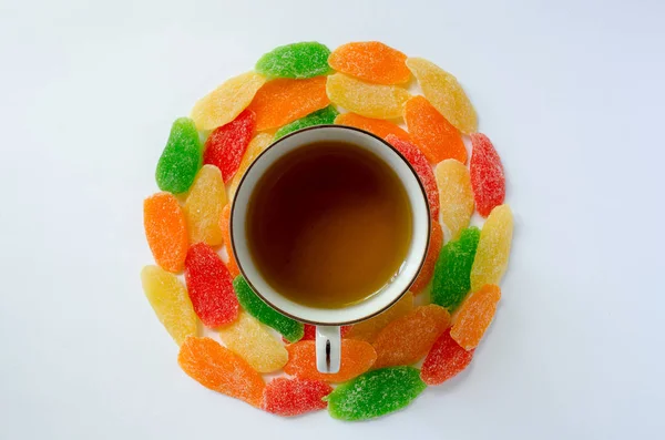 Colored mug with sweets Stock Photos, Royalty Free Colored mug with ...