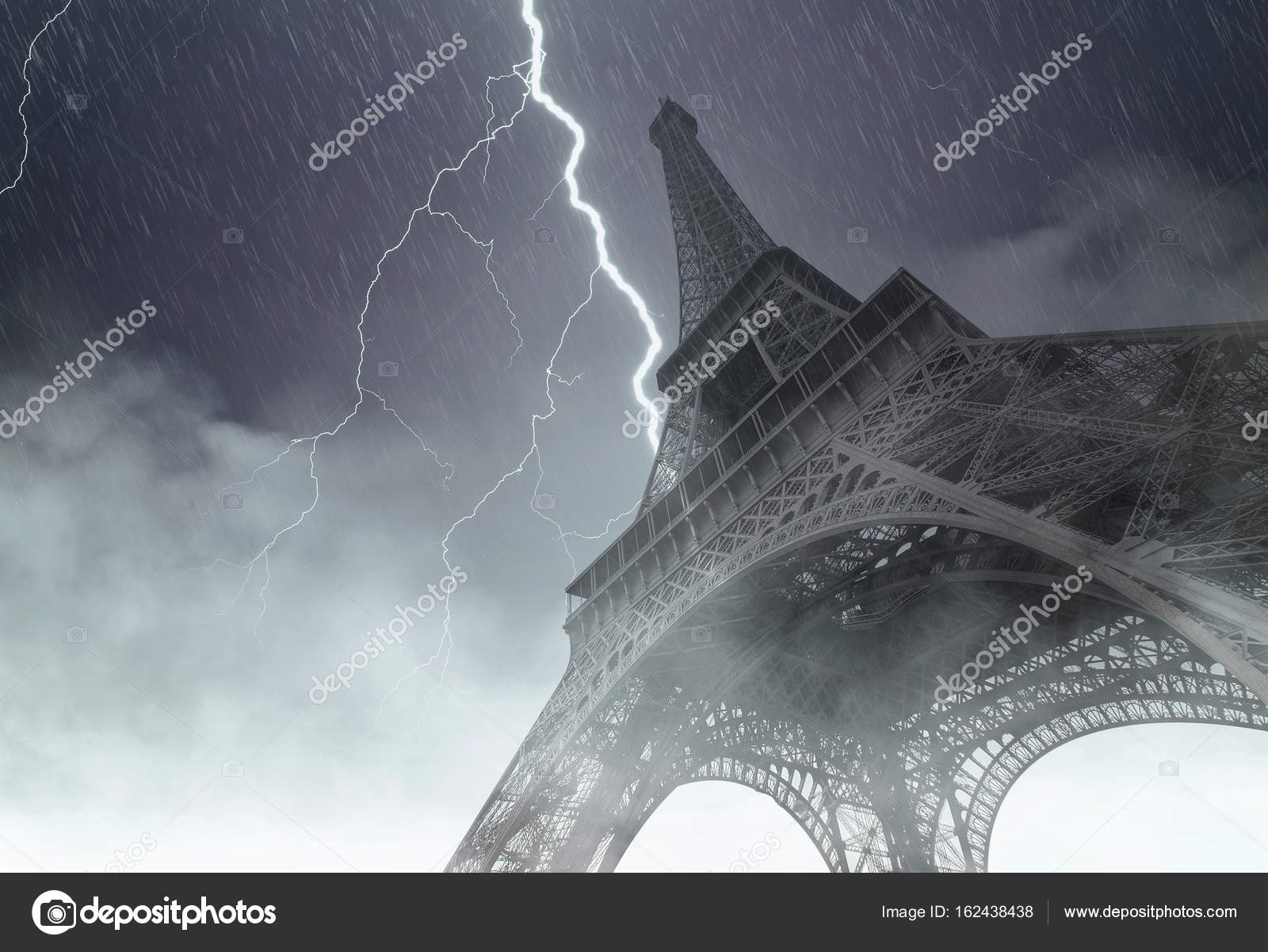 Eiffel tower during the heavy storm, rain and lighting in Paris ...