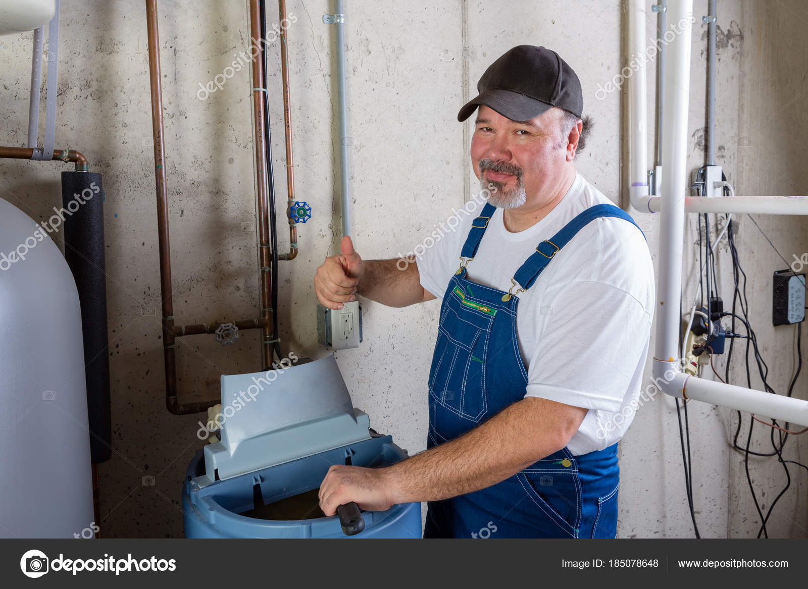Happy home installer giving a thumbs up gesture Stock Photo by ...