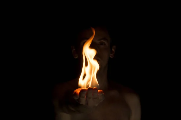 Man holding fire Stock Photos, Royalty Free Man holding fire Images ...