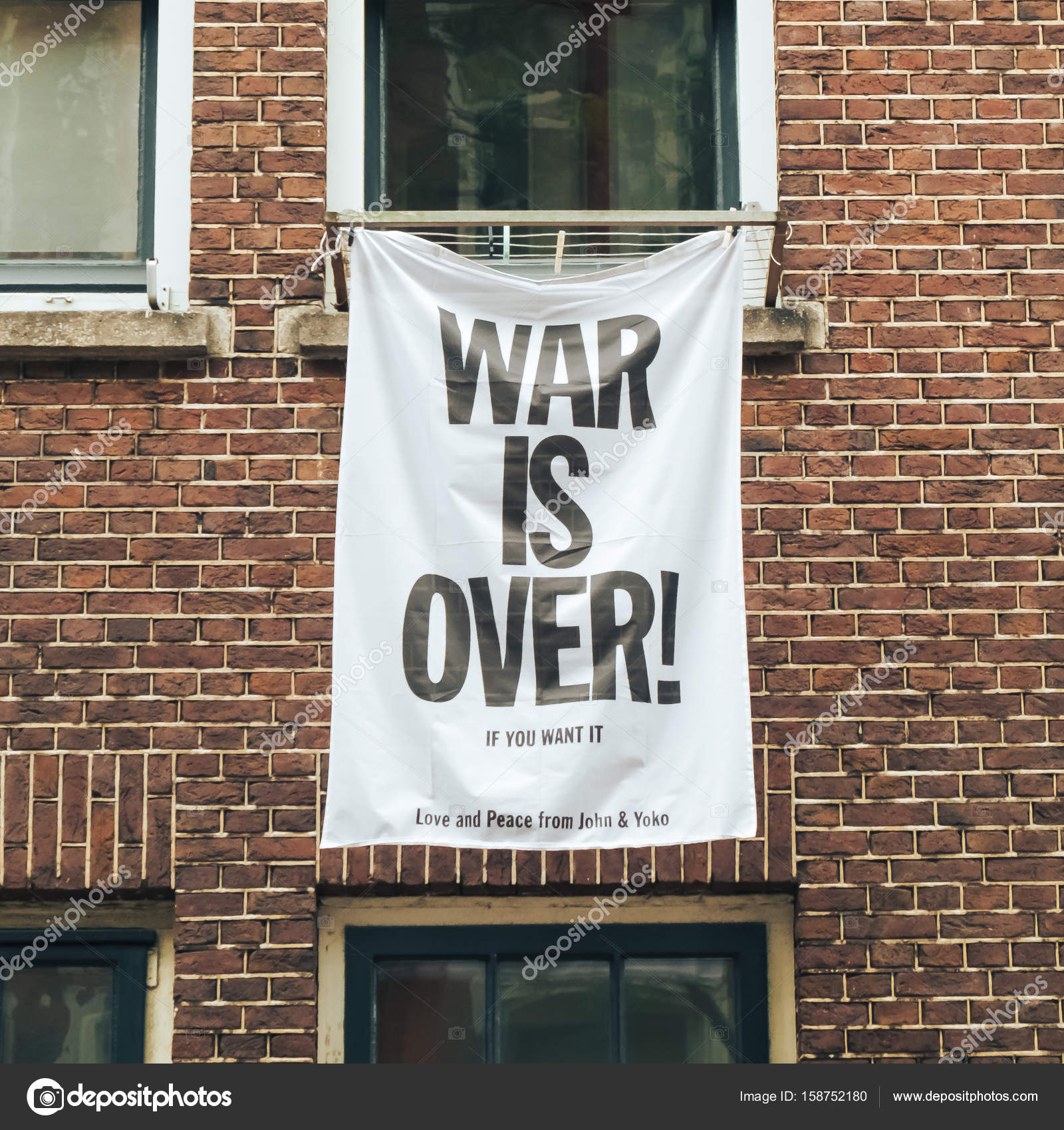 "The war is over, if you want it," the banner on the wall of the house ...