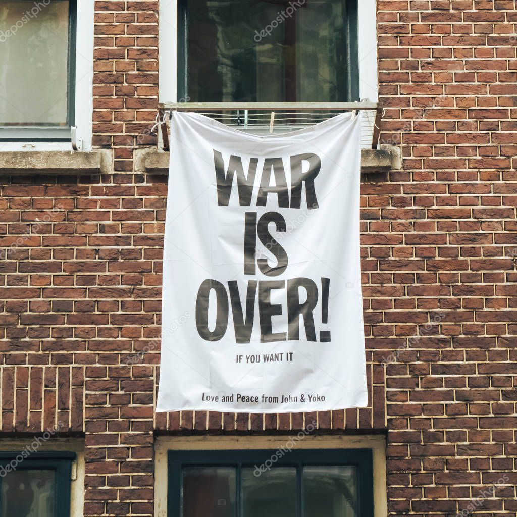 "The war is over, if you want it," the banner on the wall of the house ...